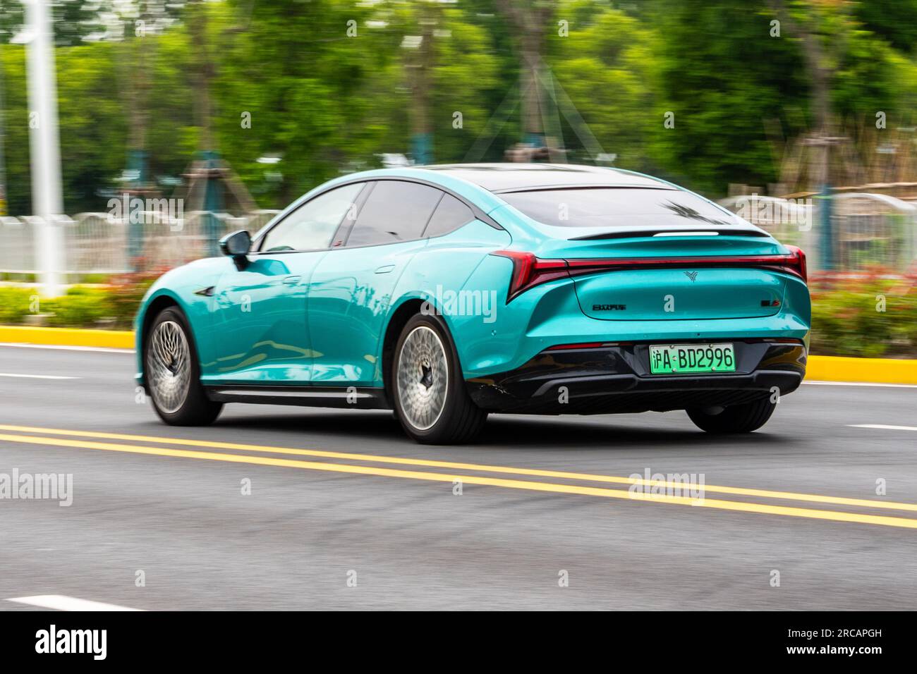 An electric Neta S sedan, from a Chinese EV startup, driving by in ...