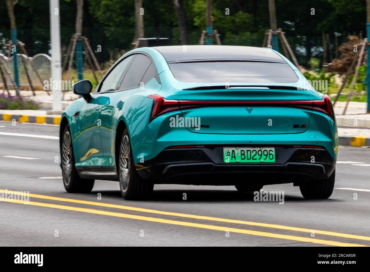 An electric Neta S sedan, from a Chinese EV startup, driving by in ...