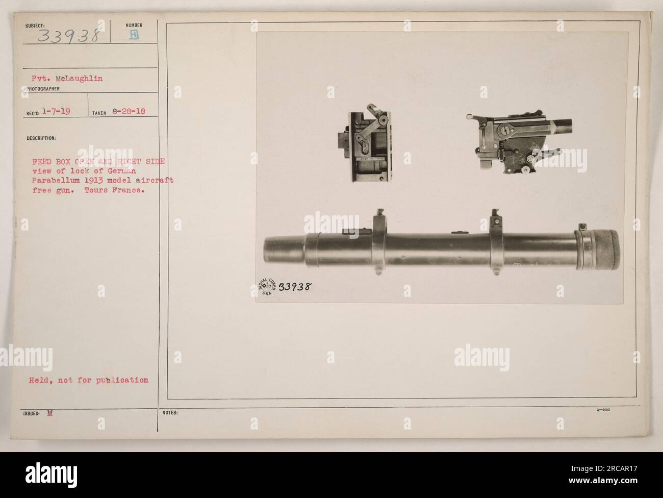 American soldier holding a German Parabellum 1913 model aircraft ...