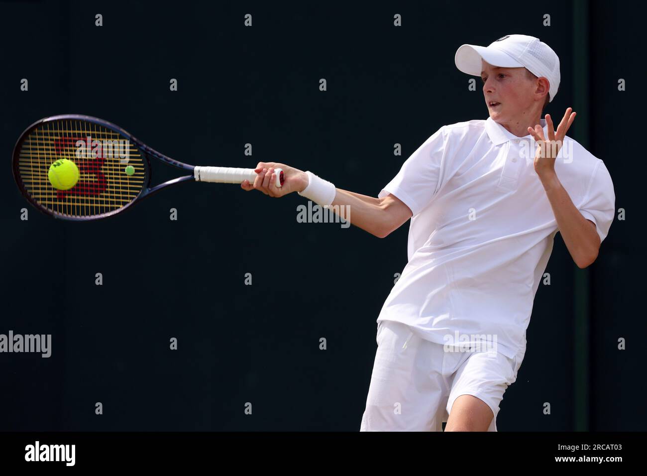 Lachlan King in action during the Boys'' 14 & Under Singles match on ...