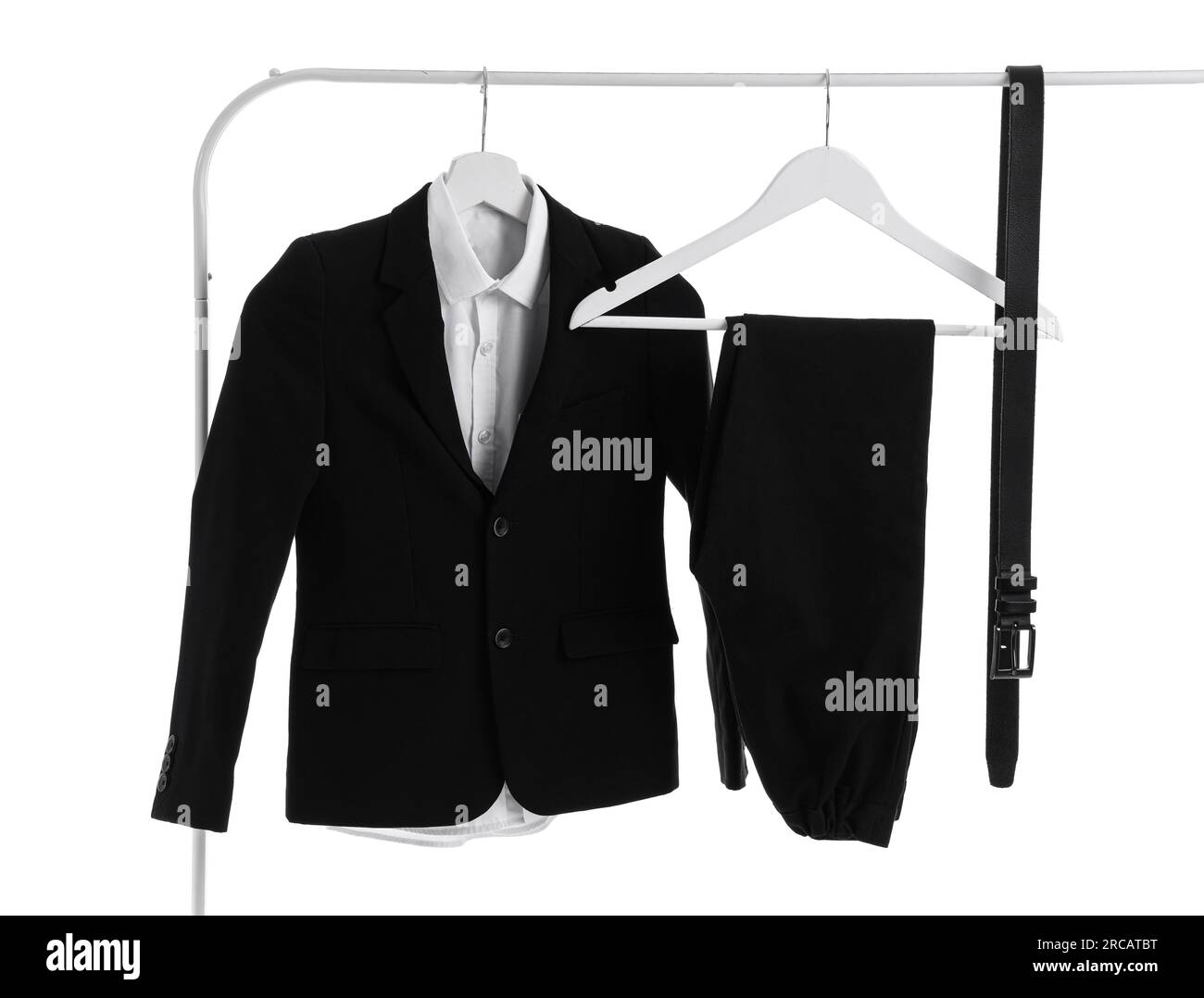 Rack with stylish black school uniform on white background Stock Photo ...