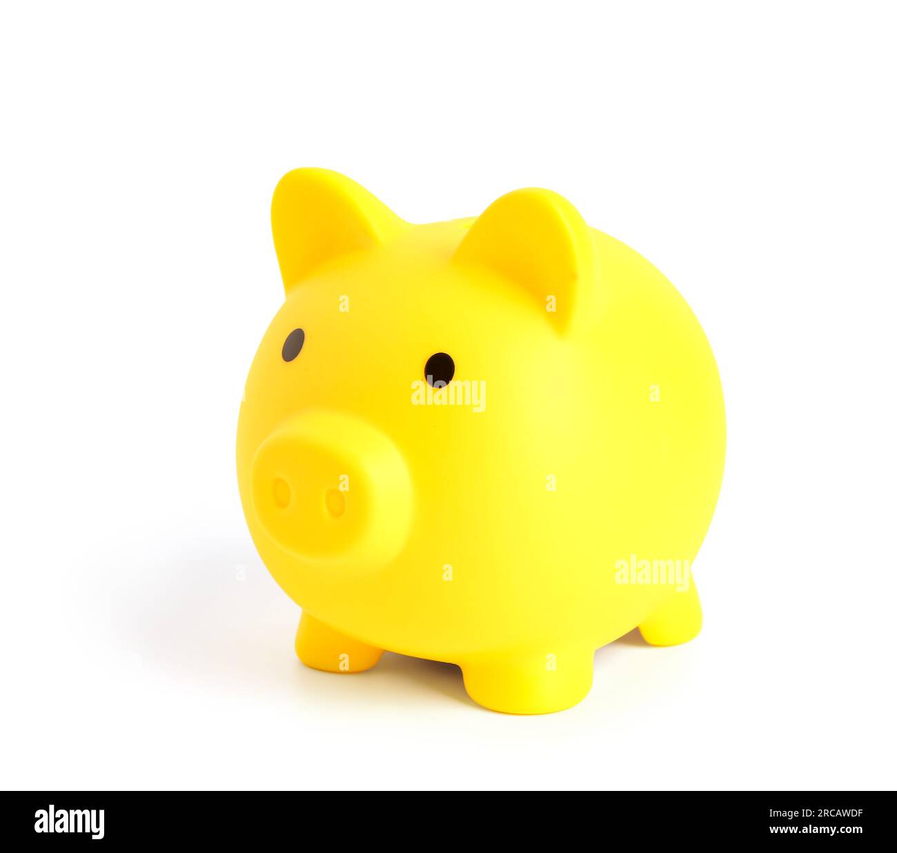 Yellow piggy bank isolated on white background Stock Photo - Alamy