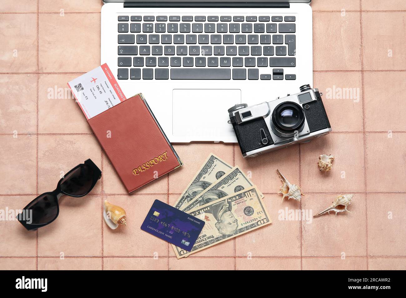 Composition with credit card, money, laptop and photo camera on color ...