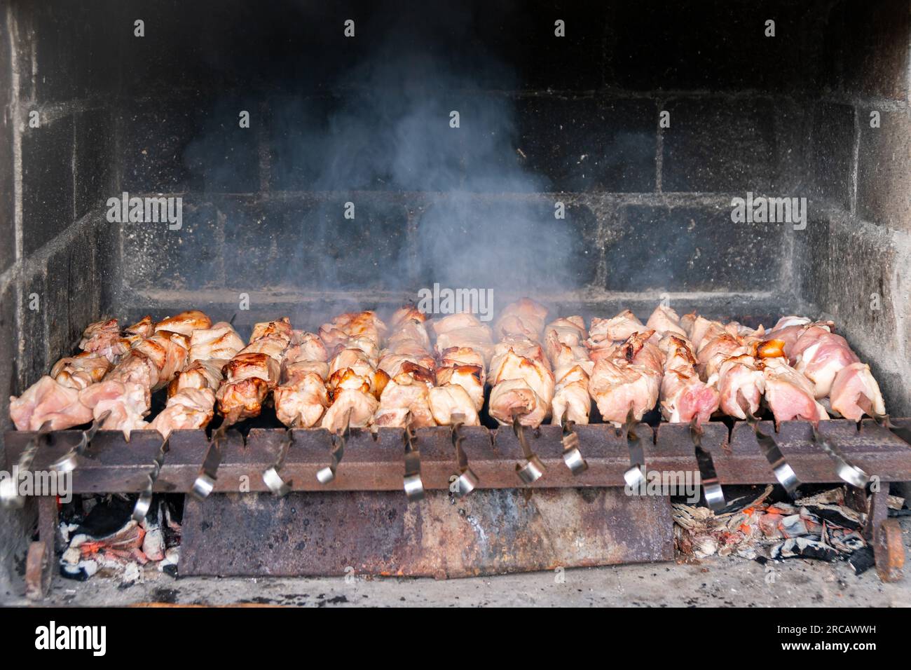 Traditional georgian mtsvadi, grill on the coals with smoke. Shashlik ...