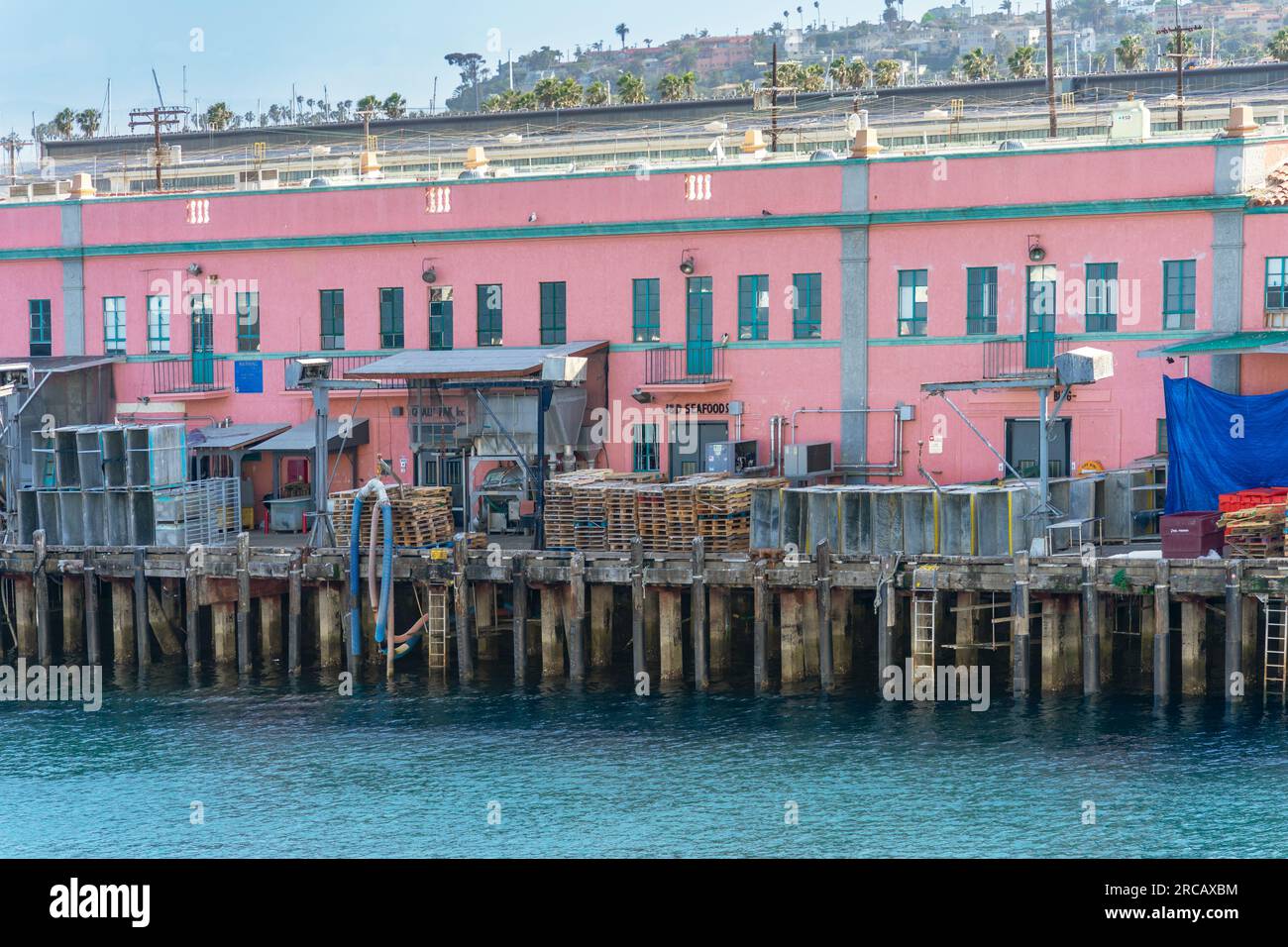 San Pedro, CA, USA – June 2, 2023: Old pink building on a boat dock in ...