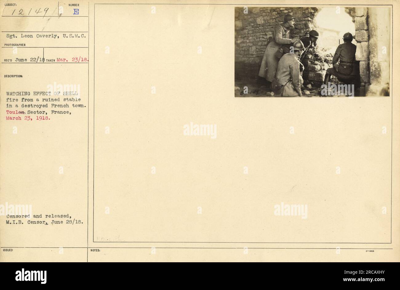 "A U.S. Marine, Sgt. Leon Caverly, watching the impact of shellfire ...