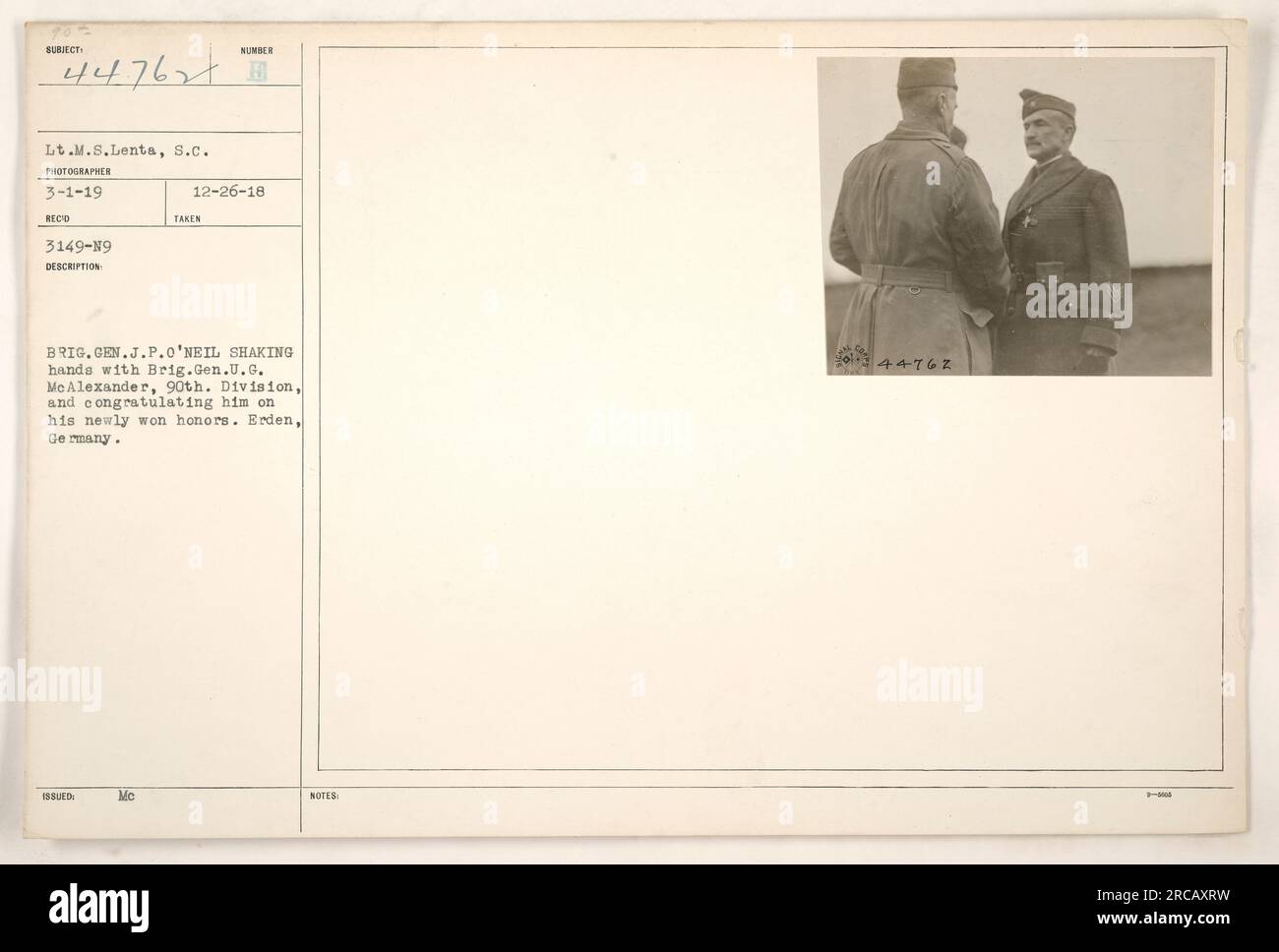 Brigadier General J.P. O'Neil shaking hands with Brigadier General U.G ...