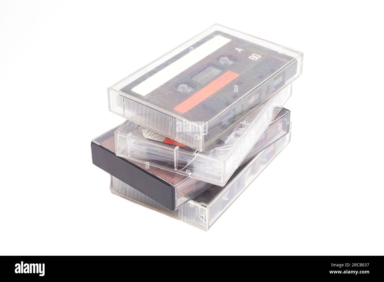 Stack of vintage audio cassettes isolated on white Stock Photo - Alamy
