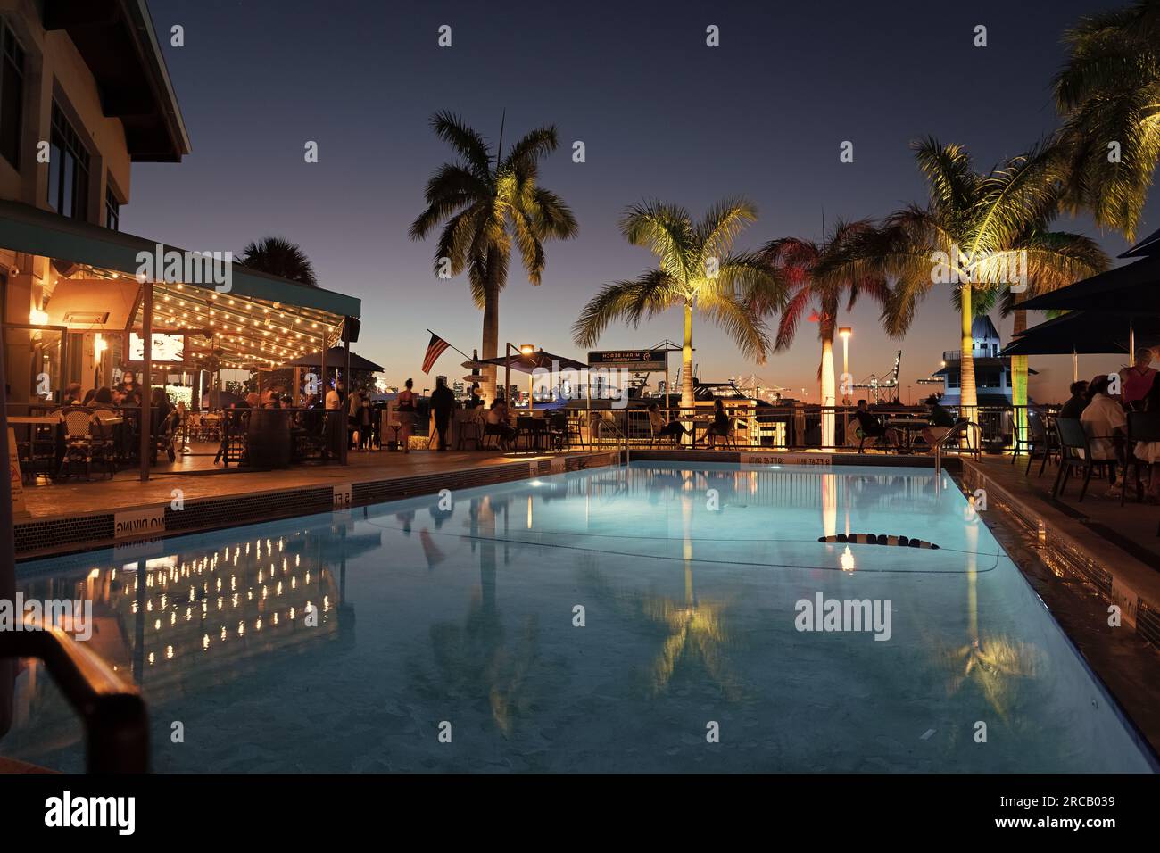 Miami, Florida USA - March 24, 2021: summer vacation at swimming pool ...