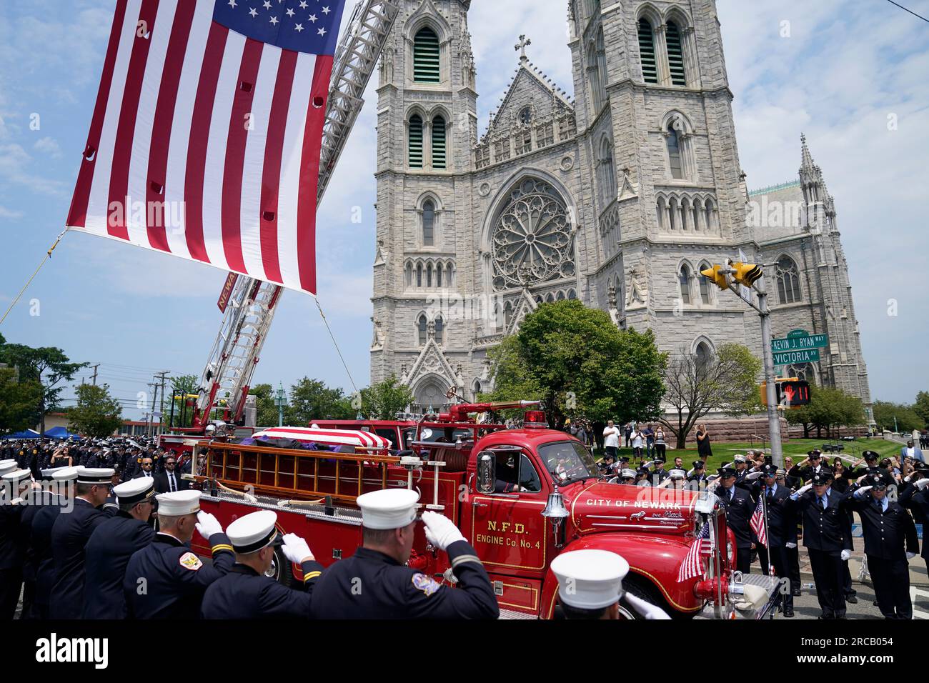 The casket of Newark firefighter Augusto "Augie" Acabou departs aboard ...