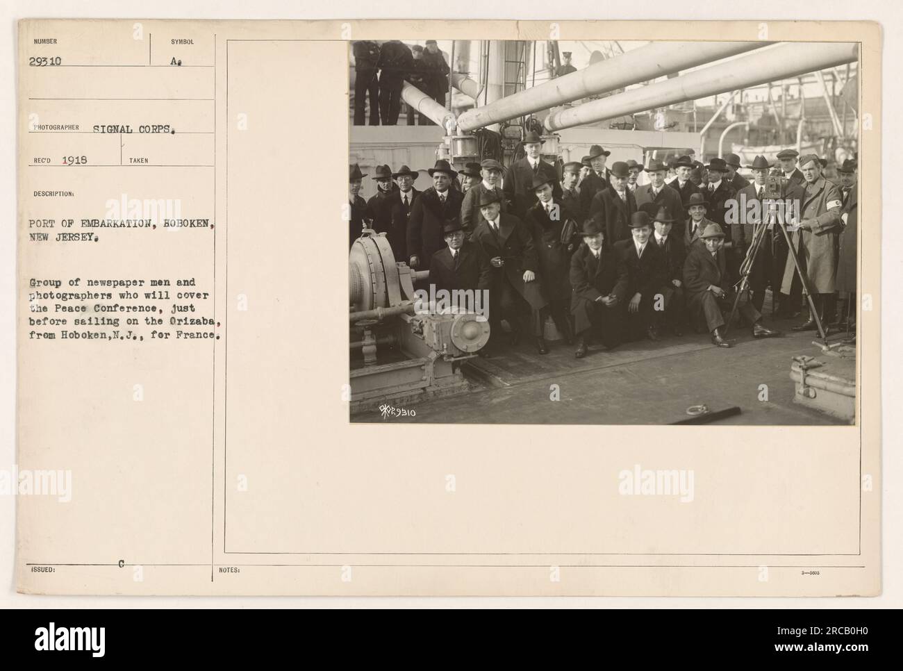 A group of newspaper men and photographers preparing to cover the Peace ...