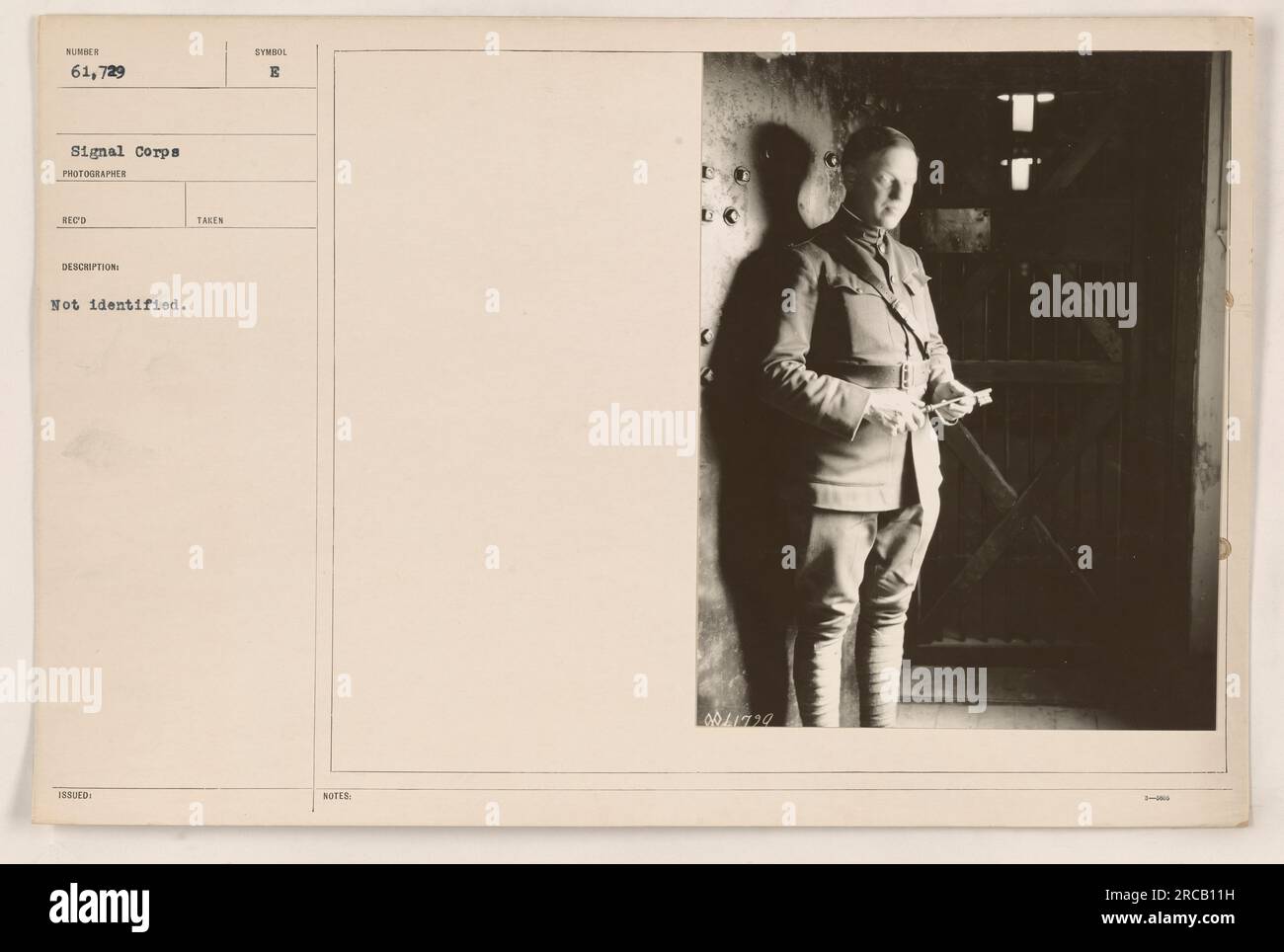 Soldier sitting at a writing desk, presumably drafting a letter. The ...
