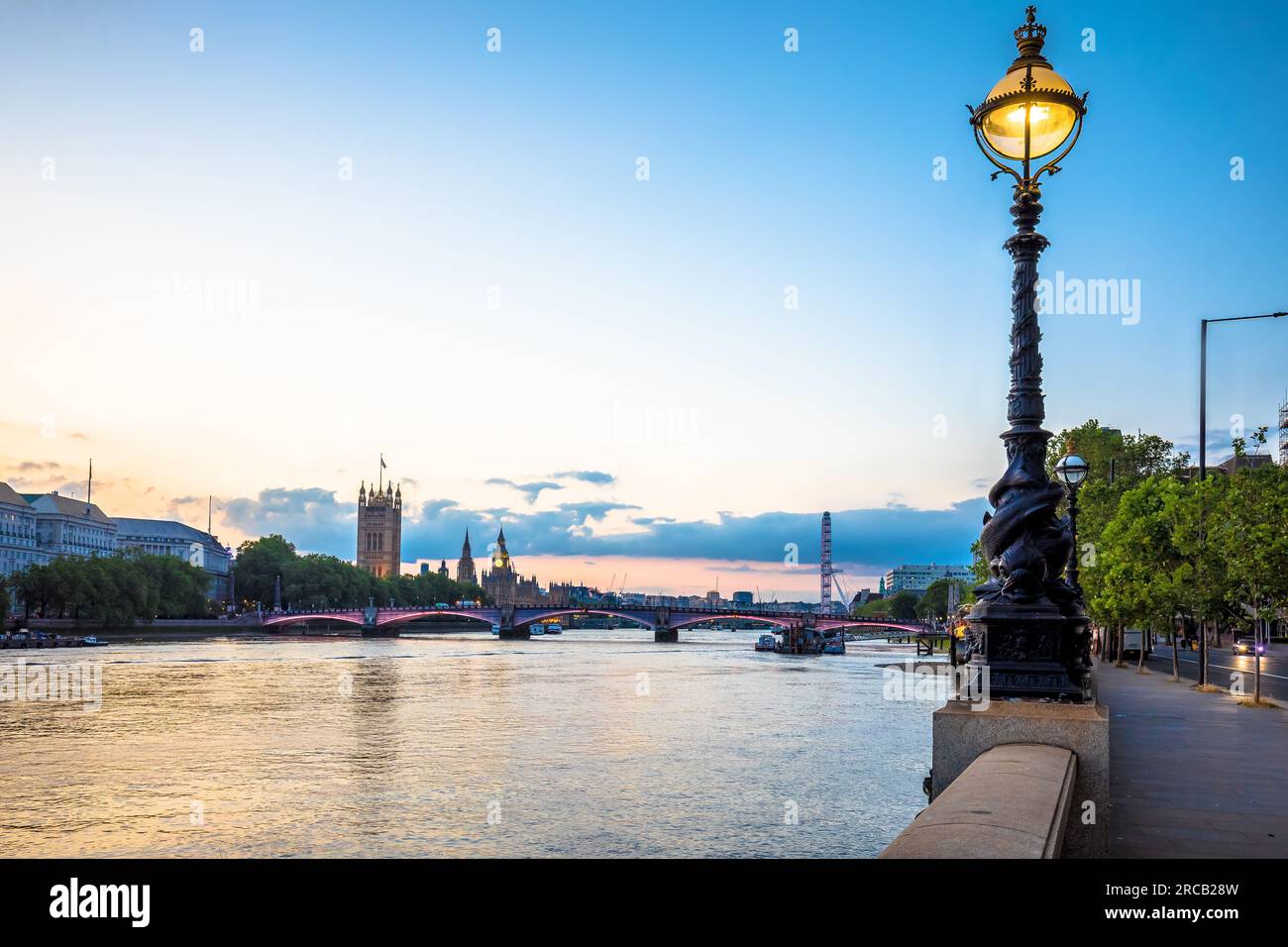 Bigh Ben and Thames riverfront sundown view in London, capital of ...