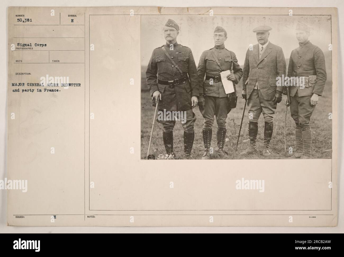 Major General Andre Brewster and his party posing for a photograph in ...