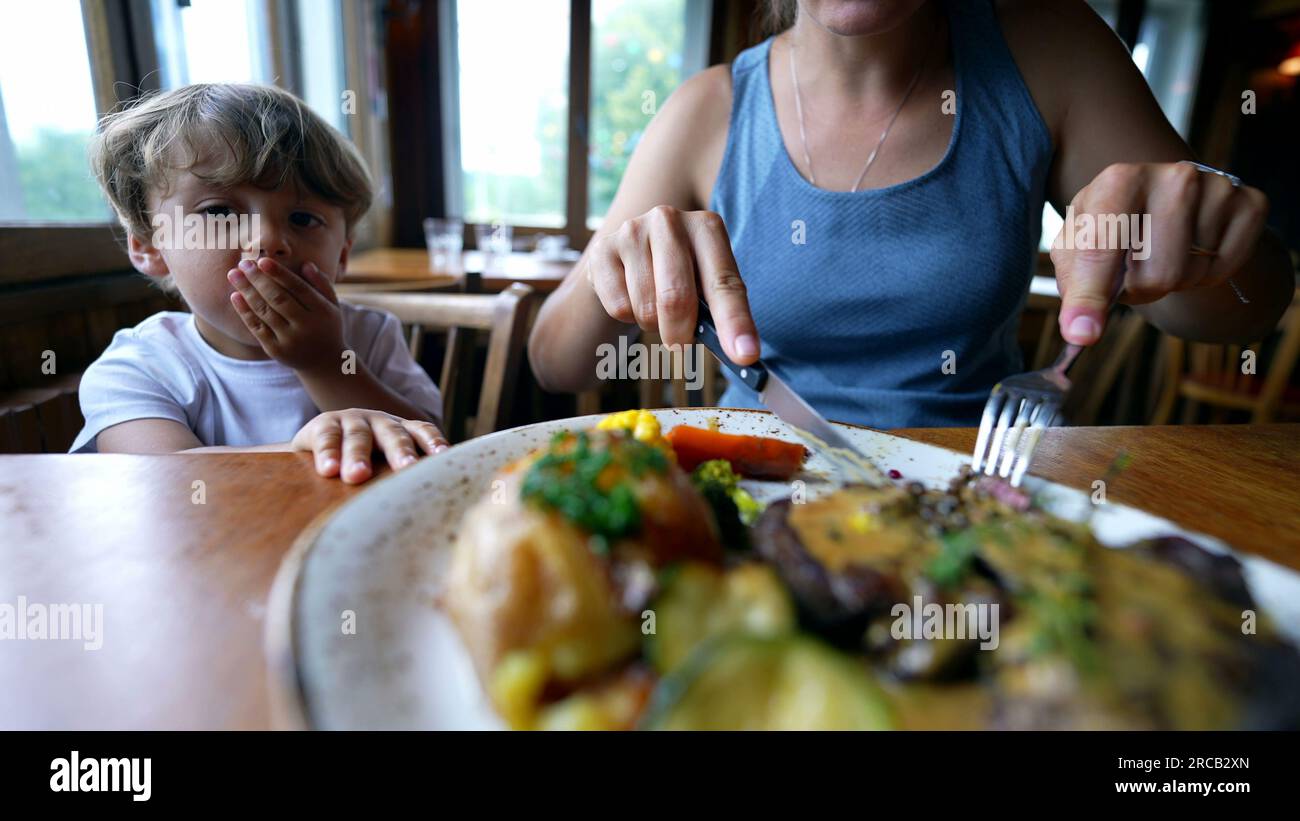Mother feeding child healthy food mom feed little boy healthy meal ...