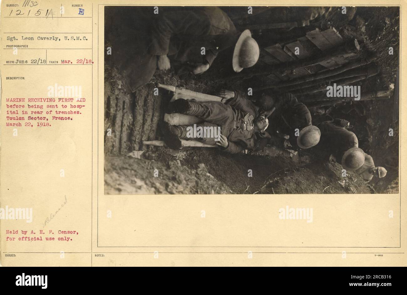 Sgt. Leon Caverly of the U.S. Marine Corps receives first aid before ...