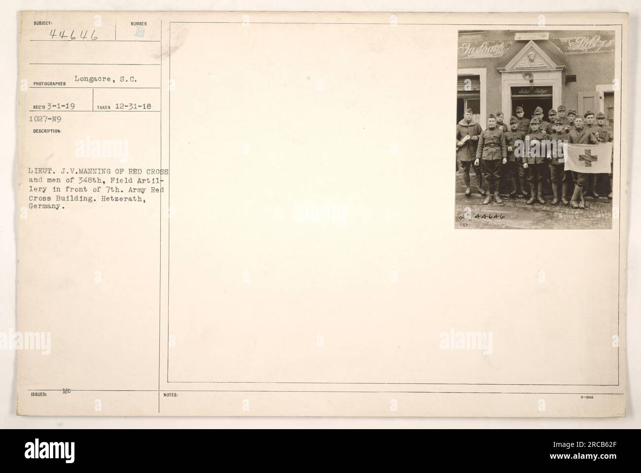 Lieutenant J.V. Manning of the Red Cross is pictured alongside soldiers ...