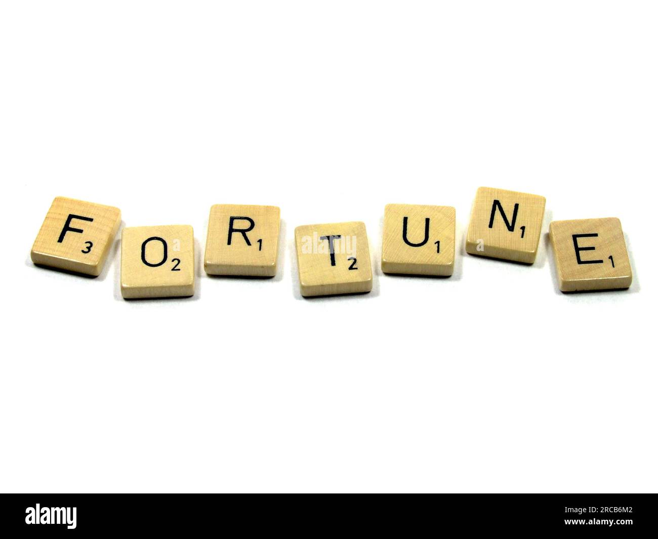 Fortune written with scrabble stones Stock Photo - Alamy