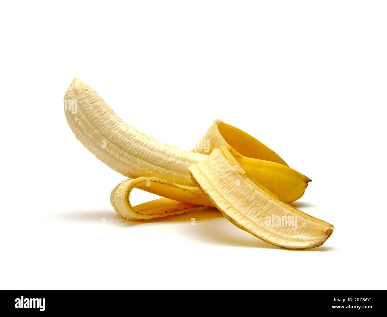 One peeled banana Stock Photo - Alamy
