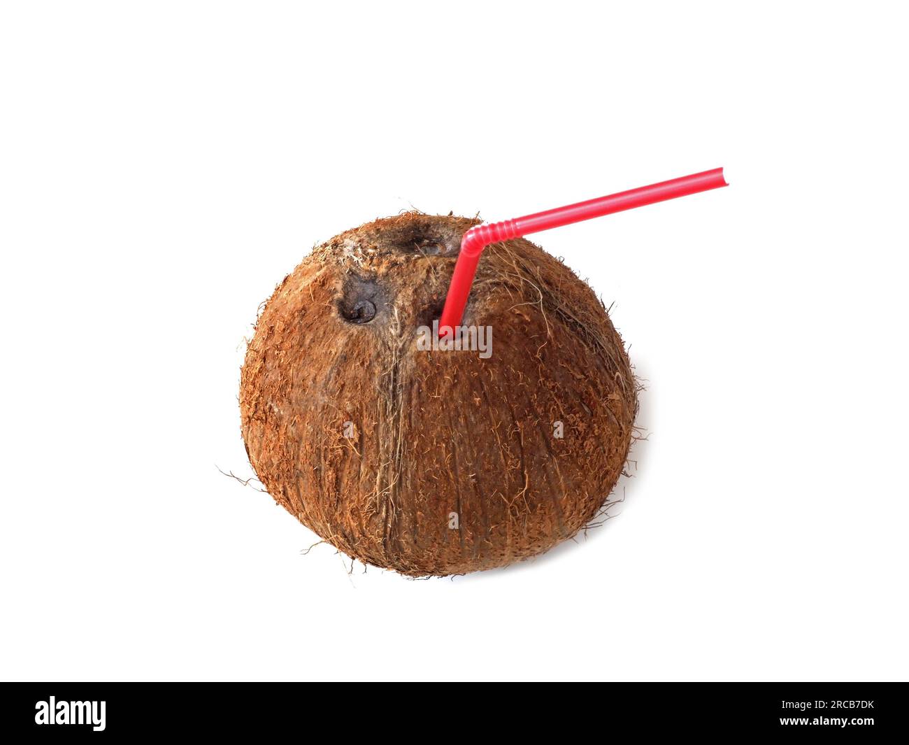 A coconut with straw Stock Photo - Alamy