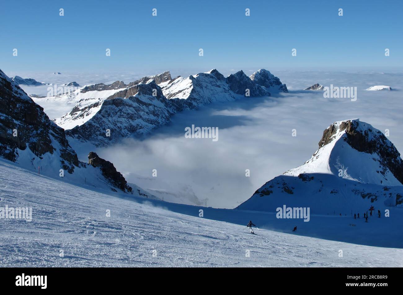 Skiing above the fog, Titlis ski area Stock Photo - Alamy