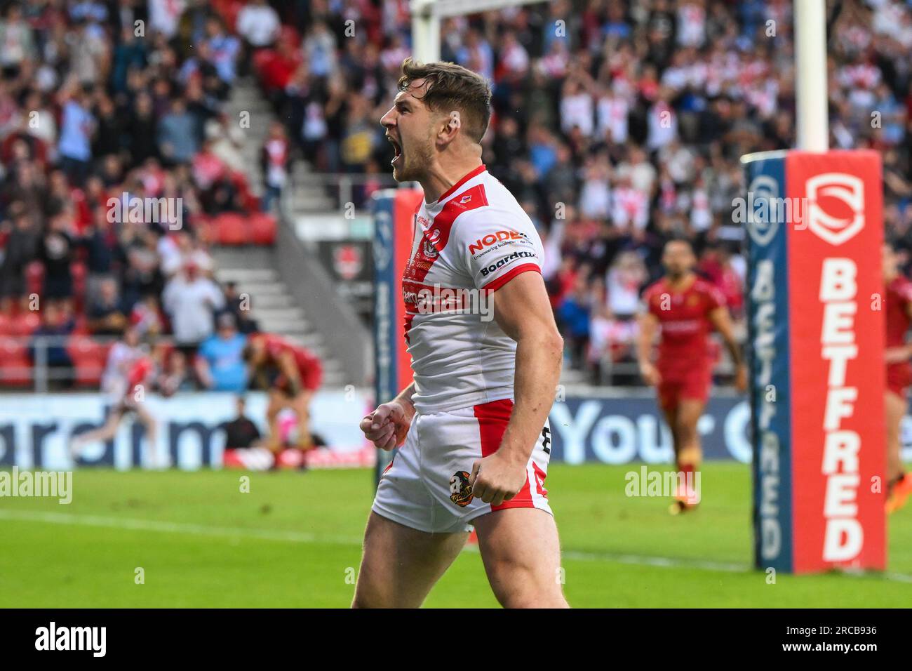 Mark Percival #4 of St Helens celebrates his tryduring the Betfred ...