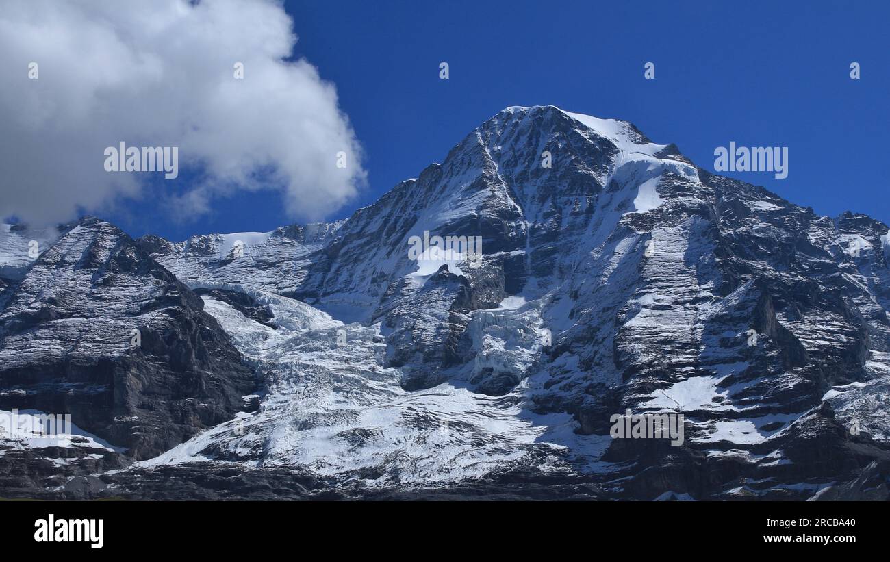Monch, high mountain in the Swiss Alps Stock Photo - Alamy