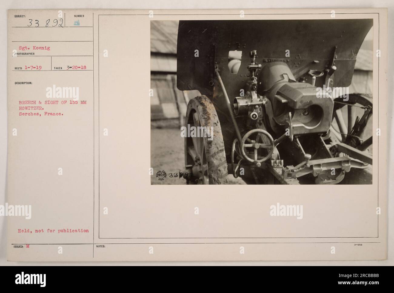 Sgt. Koenig is pictured here examining the breech and sight of a 155 mm ...