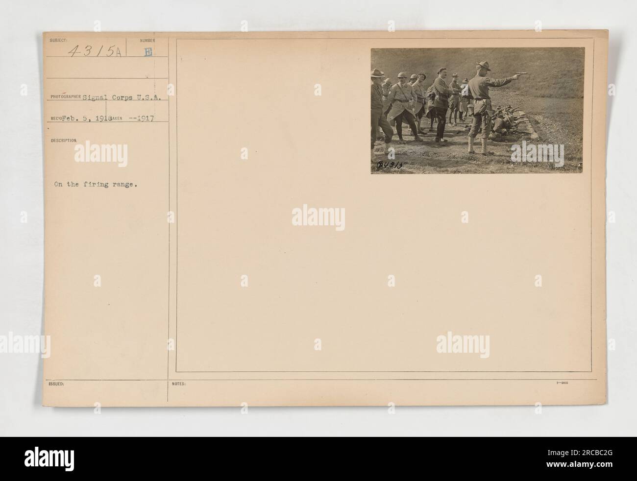 Soldiers practicing their marksmanship on a firing range during World War One. The photograph ...