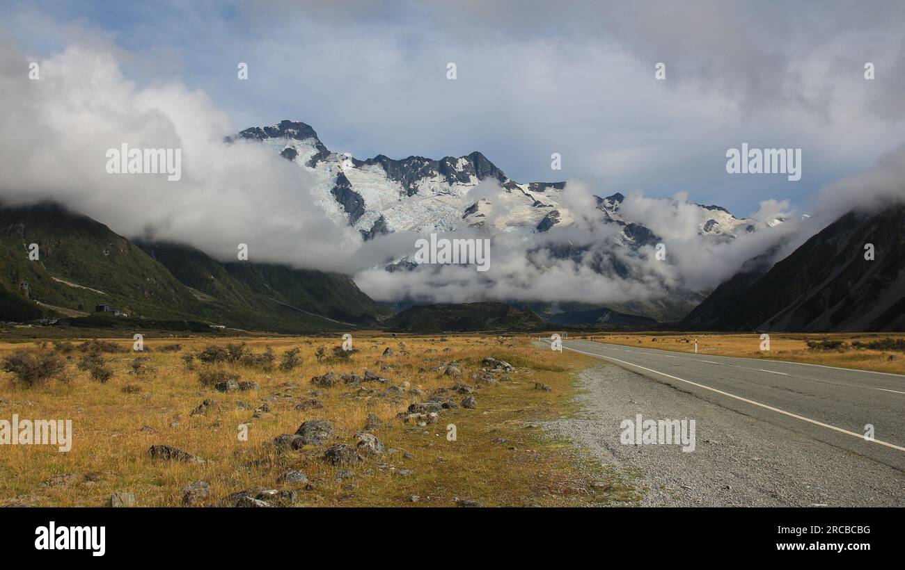 Road towards Mount Cook village. Mount Sefton and The Footstool Stock ...