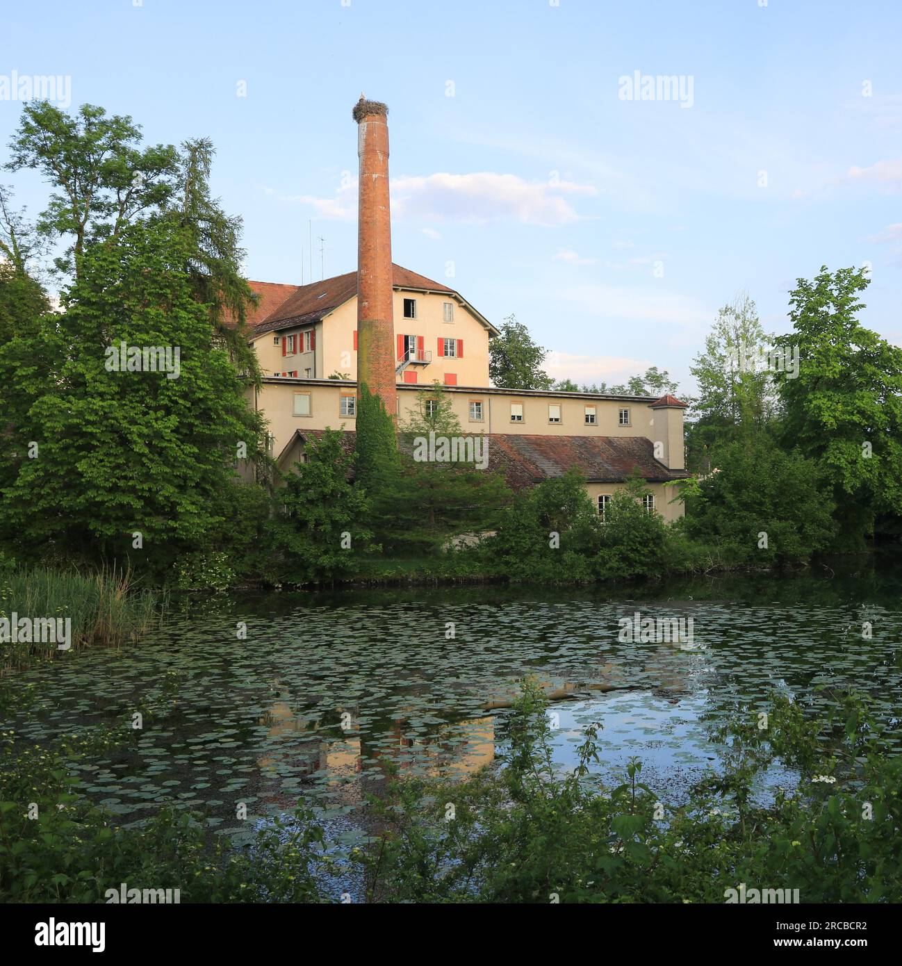 Schoenau, old factory in Wetzikon, Zurich. Beautiful old chimney with a ...