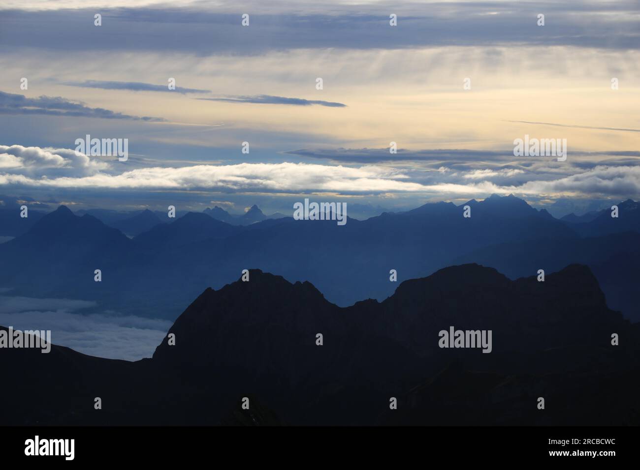 Dramatic morning sky over Mount Stanserhorn and other mountains of the ...