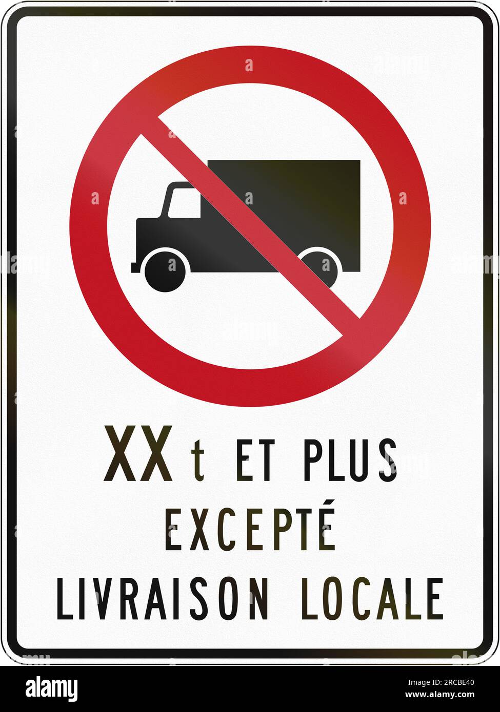 Canadian regulatory traffic sign - No lorries. The text means: XX tons ...