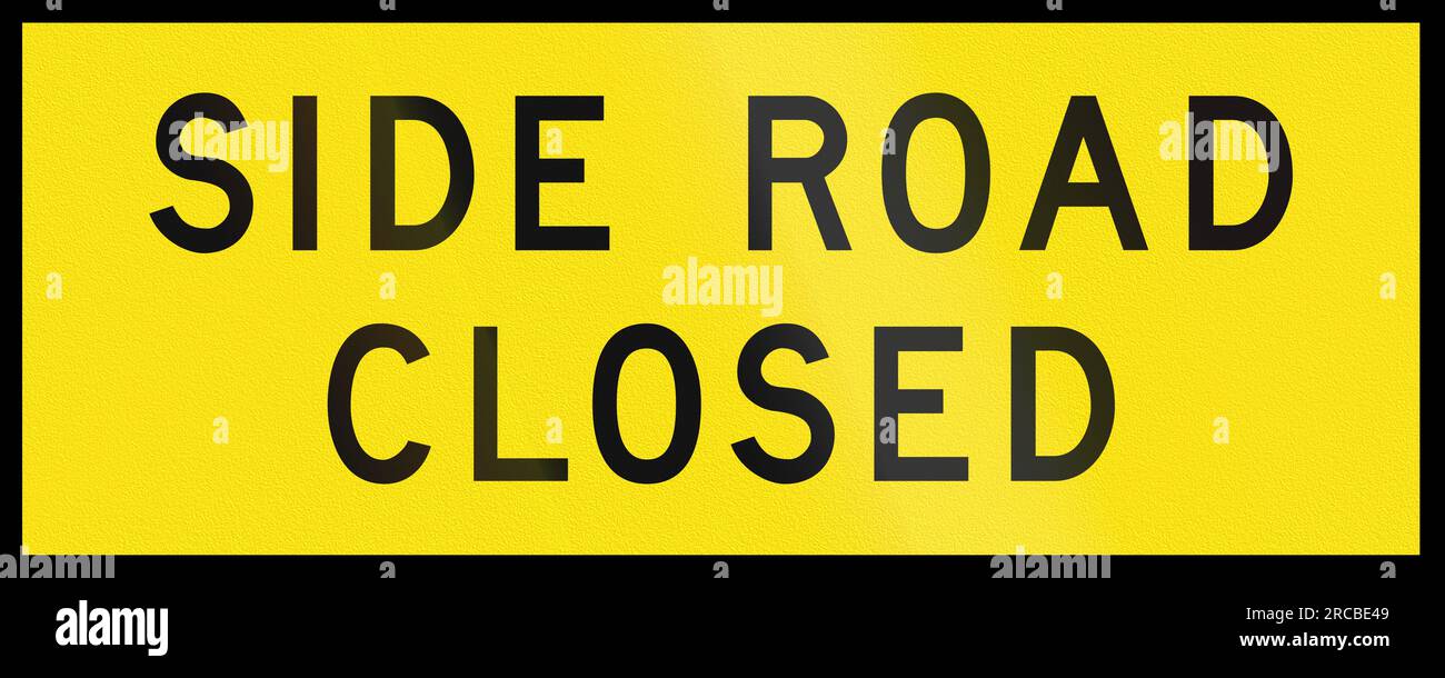 An Australian temporary road sign - Side road closed Stock Photo - Alamy