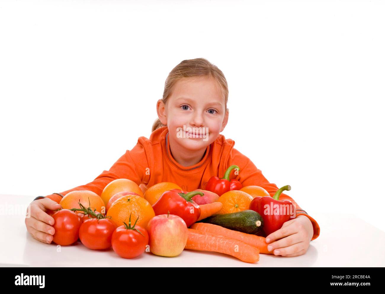 Girl with fruits and vegetables Stock Photo - Alamy