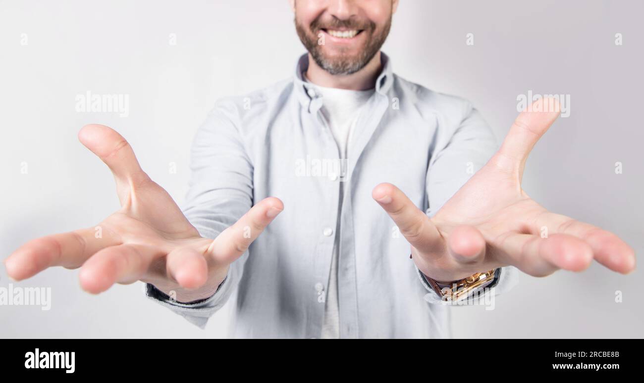 grabbing hands with grab gesture in studio. photo of grabbing hands ...