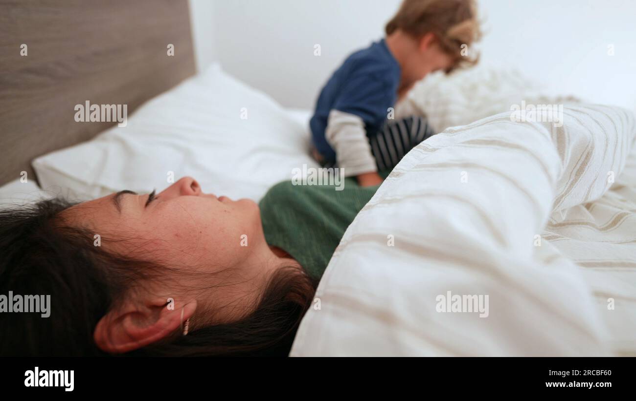 Child getting up from bed hi-res stock photography and images - Alamy