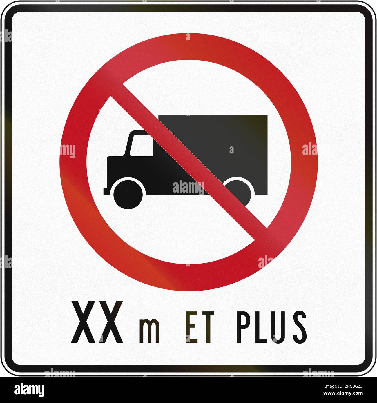 Canadian regulatory traffic sign - No lorries. The text means: XX ...