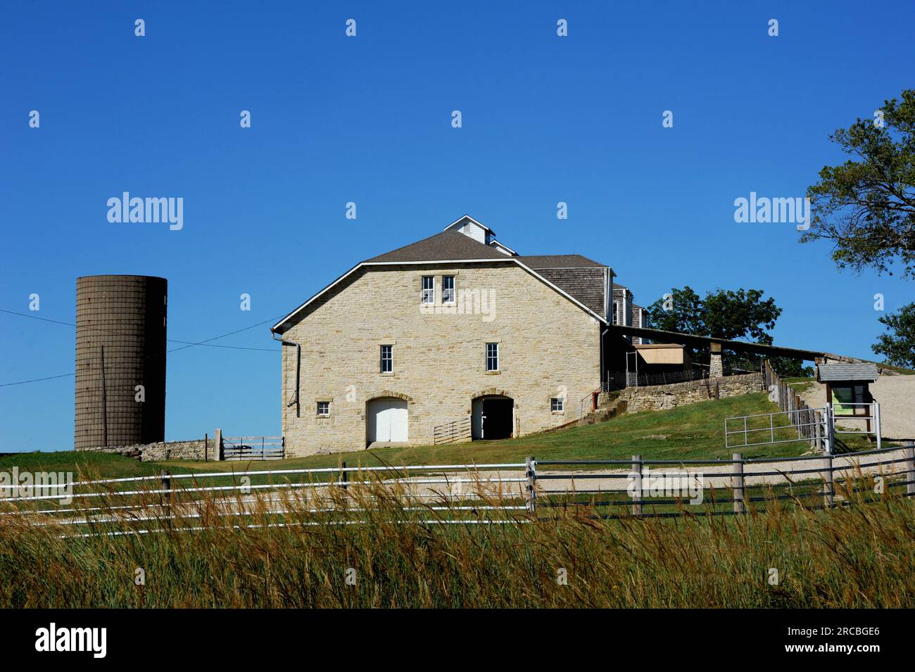 Tallgrass Prairie National Preserve includes a large stone barn. It is ...