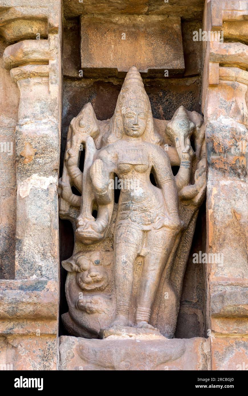 Eight-armed Mahishasuramardini standing with her lion, niche on the ...