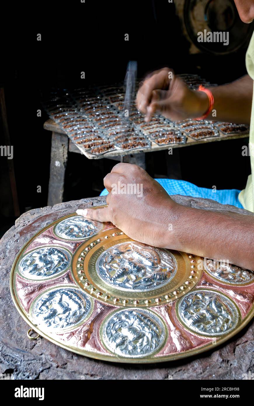 An artisan making Thanjavur Art Plate at Thanjavur Tanjore, Tamil Nadu ...
