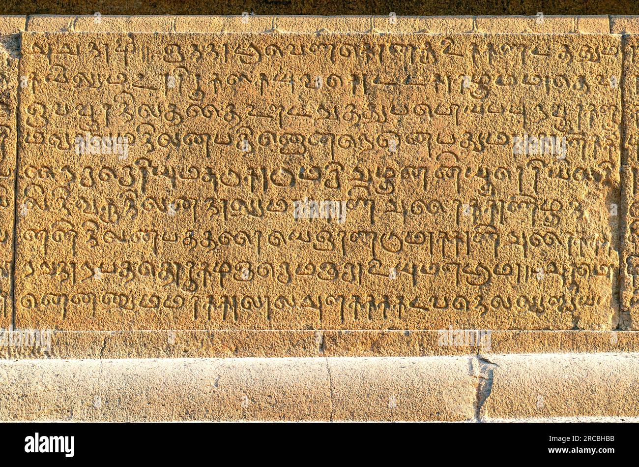 Stone Inscriptions of Tamil language carved on the exterior stone walls ...