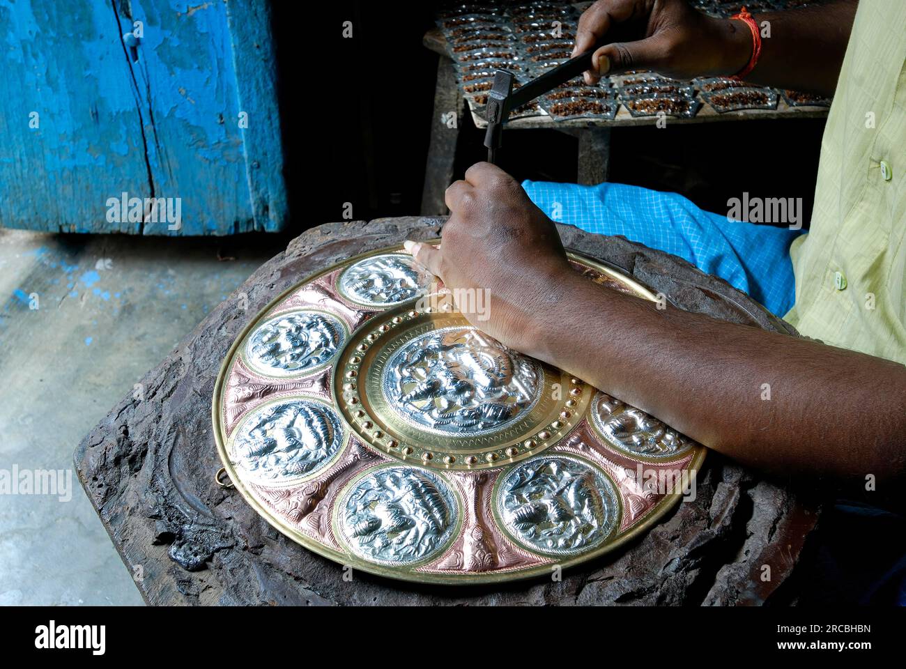An artisan making Thanjavur Art Plate at Thanjavur Tanjore, Tamil Nadu ...