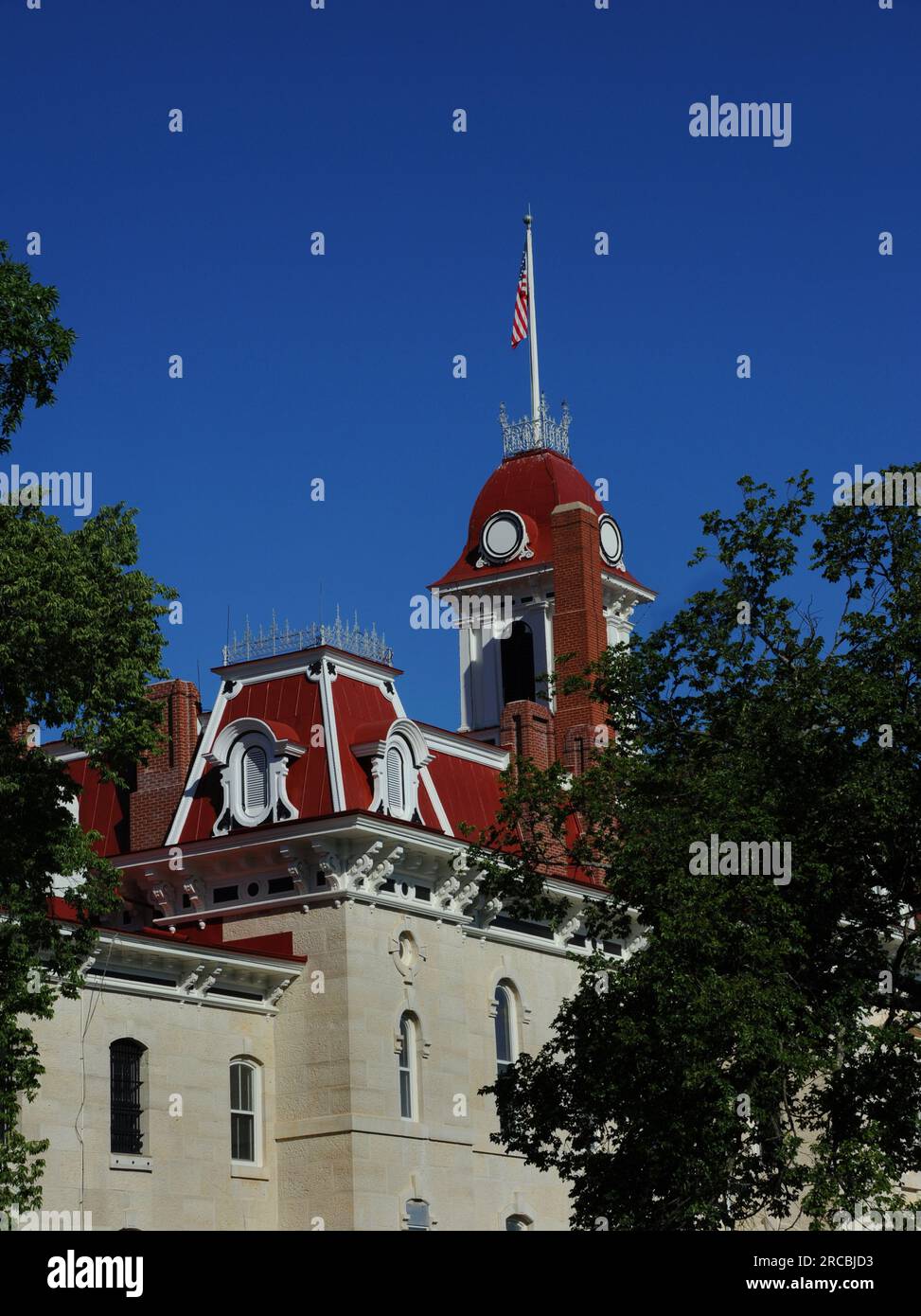 Beautiful courthouse in Cottonwood Falls, Kansas has burgundy roof ...