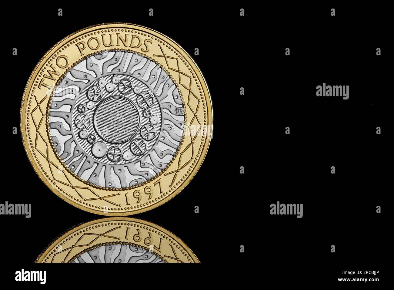 The first United Kingdom bimetallic £2 coin issued in 1997 with the ...