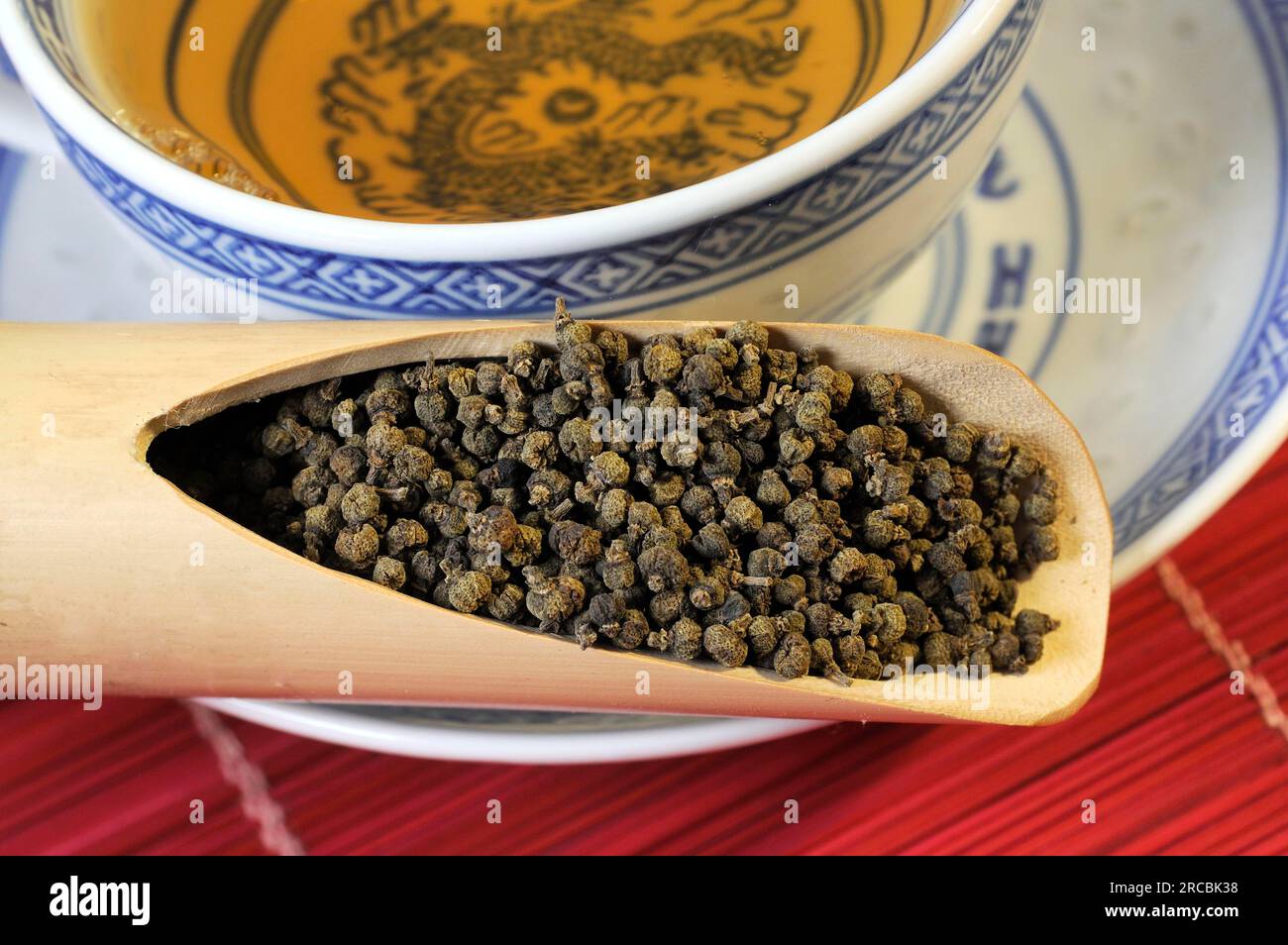Cup of tea with medicinal Evodia fruit (Evodiae Fructus Stock Photo - Alamy