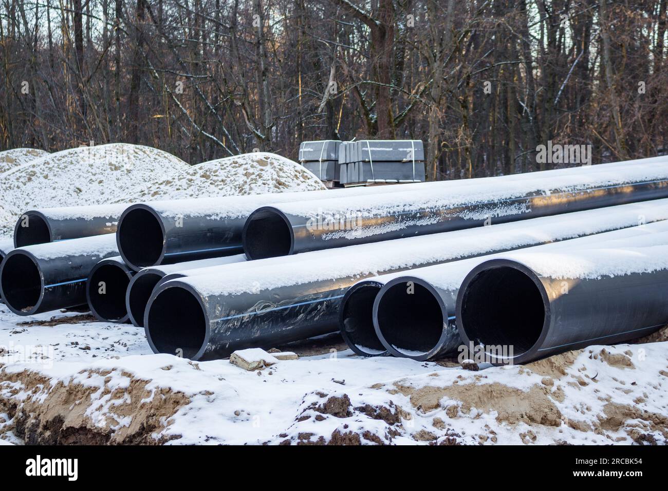 Plastic sewer pipes prepared for installation. Reconstruction of the ...