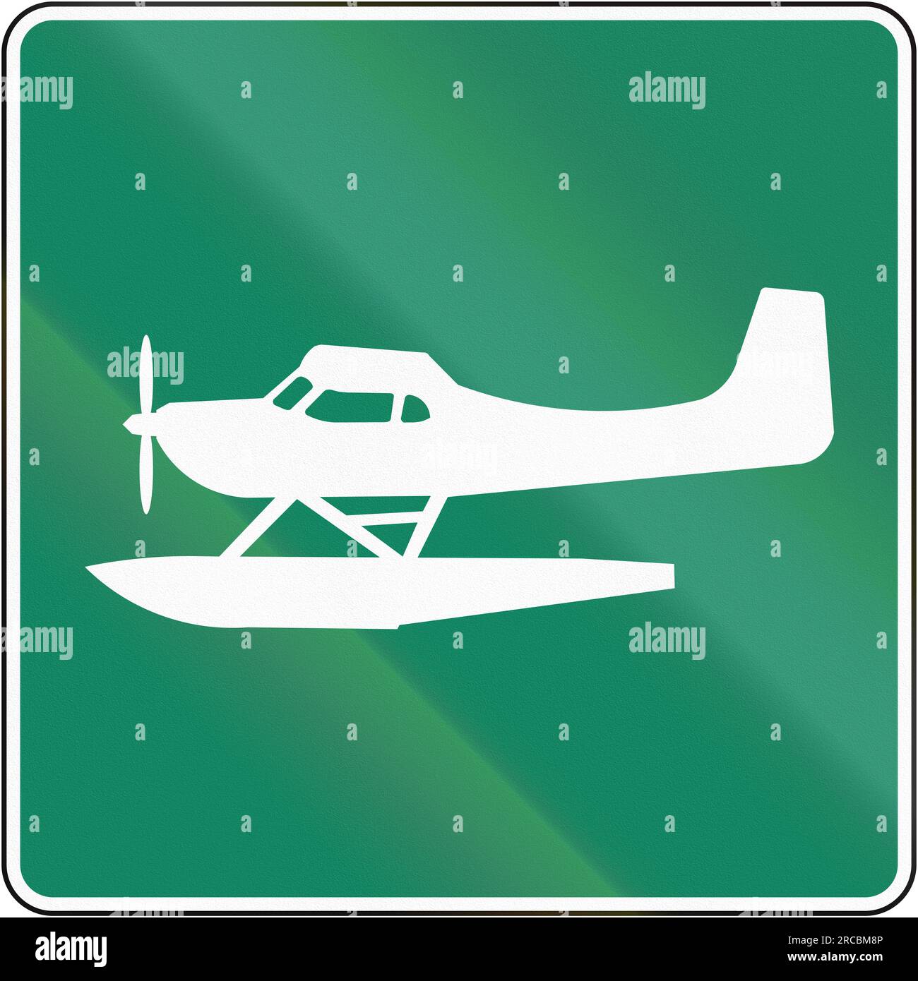 Propeller plane airport road guide sign in Canada. This sign is used in ...