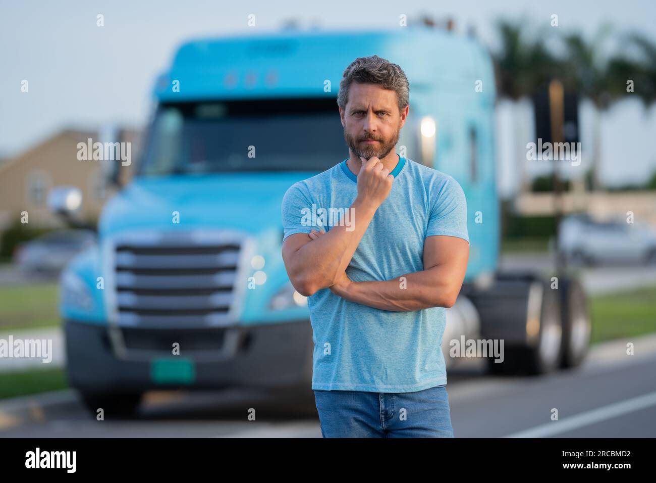 Men driver near lorry truck. Man owner truck . Serious middle aged man ...