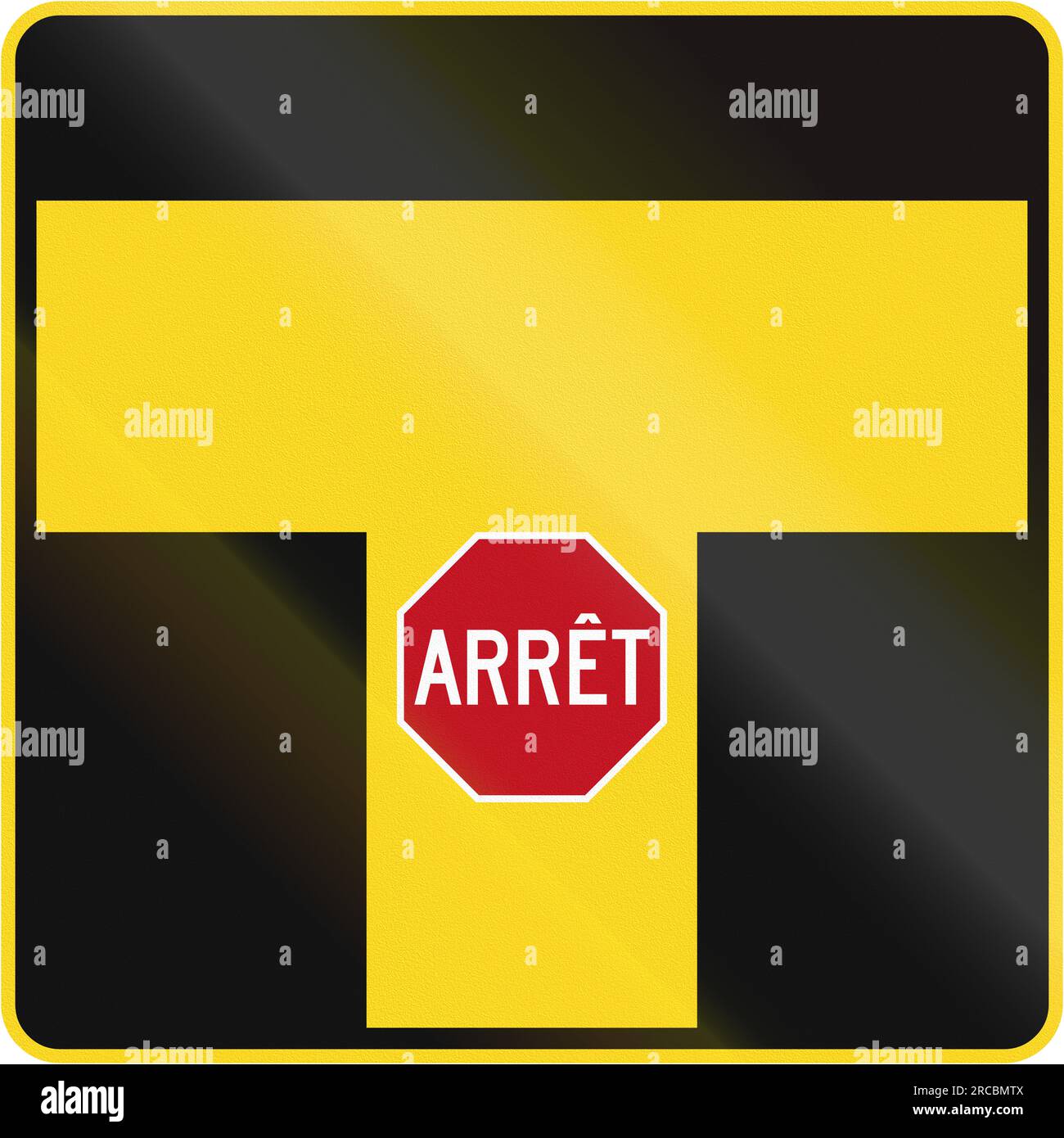 Warning road sign inQuebec, Canada - T intersection with stop signs ...